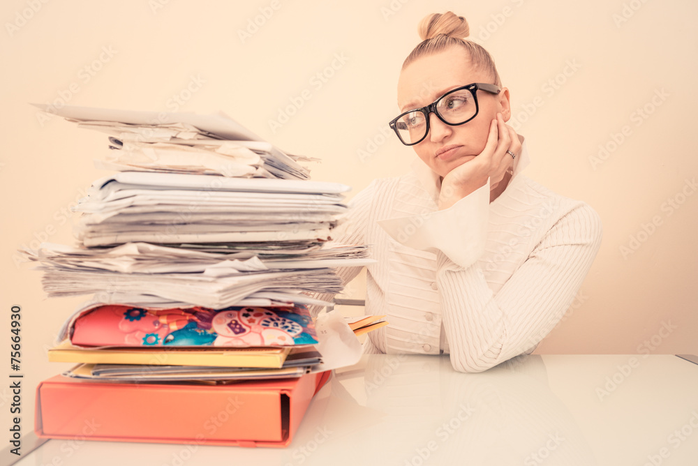 Secretary with pile of documents Stock Photo | Adobe Stock