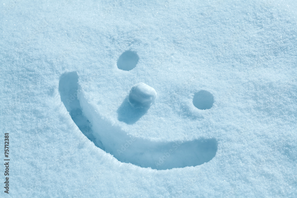 smiley face on snow surface Stock Photo | Adobe Stock