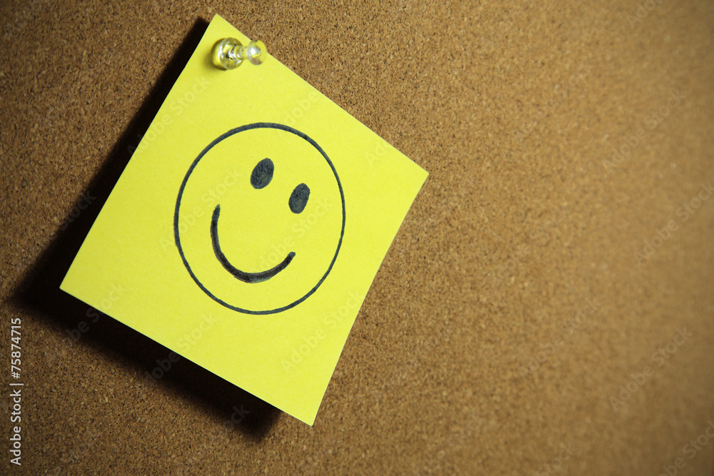 Smile symbol drawn on yellow post it note. Concept of Happiness Stock ...