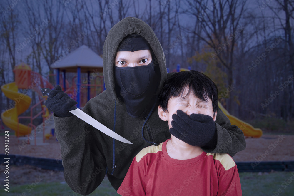 Child kidnapping by threatening Stock Photo | Adobe Stock