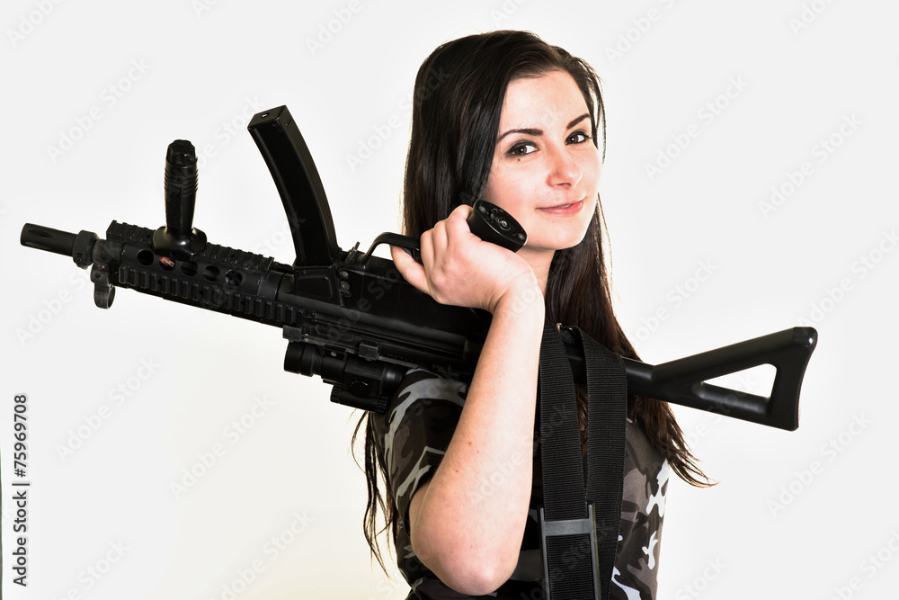 Beautiful woman with gun Stock Photo | Adobe Stock