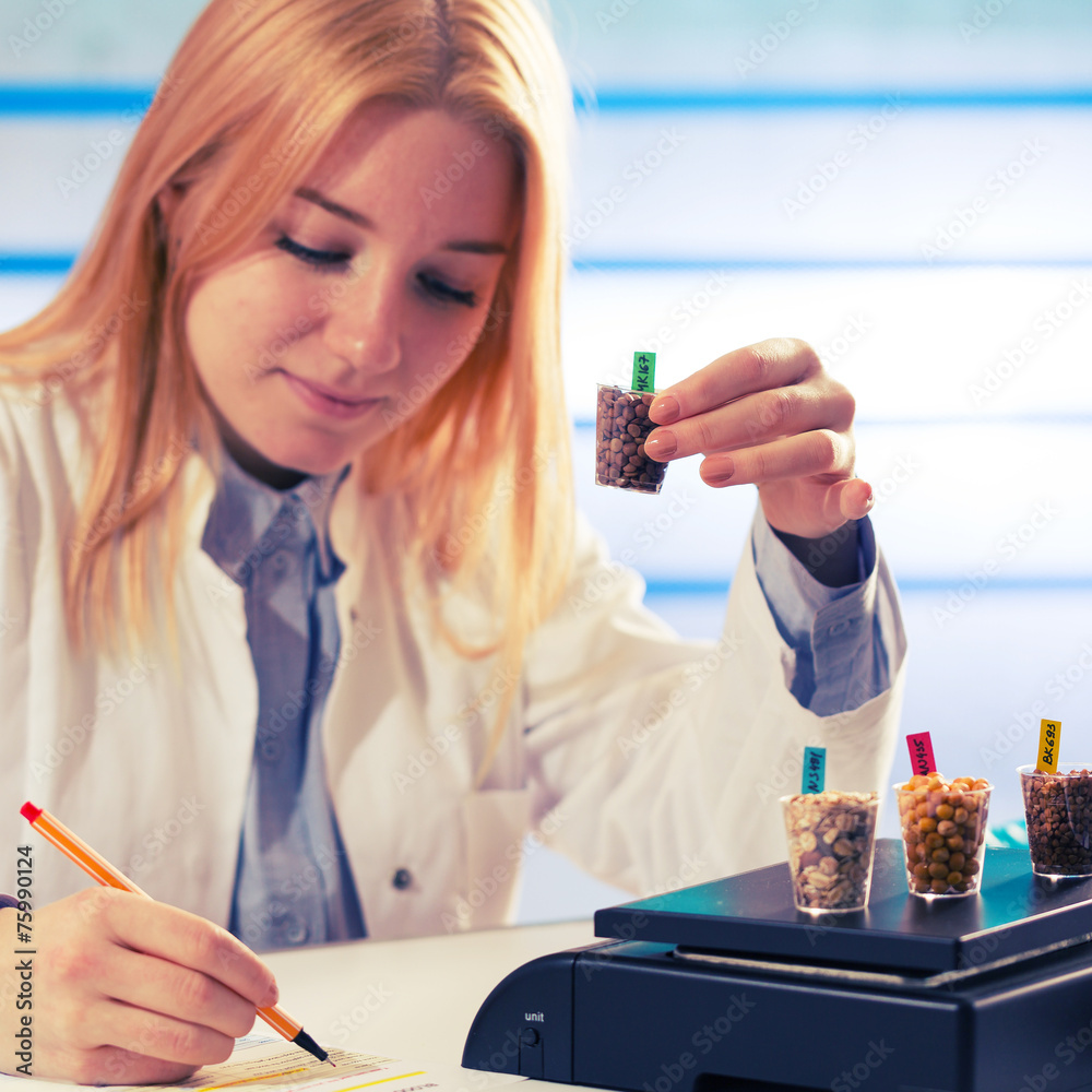 girl in the laboratory of food quality tests legumes grain Stock Photo ...