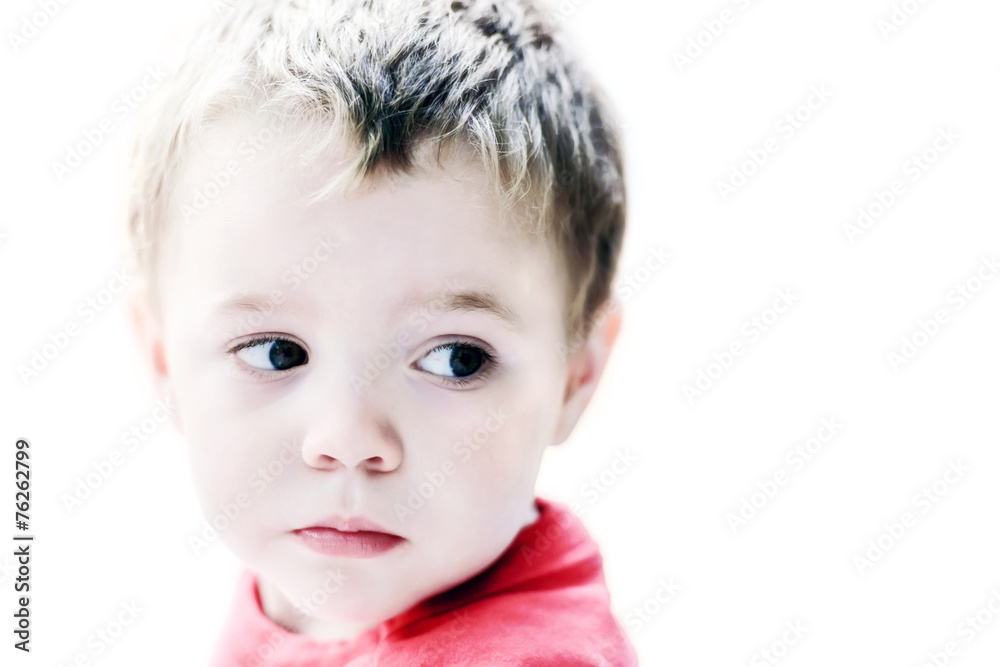 Little boy looking out the corner of his eye Stock Photo | Adobe Stock