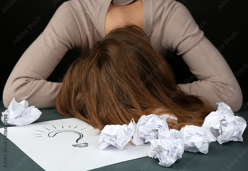 Tired woman at desk with question mark sheet of paper, Stock Photo ...