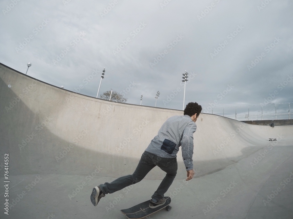 Skater in pool of skatepark Stock Photo | Adobe Stock