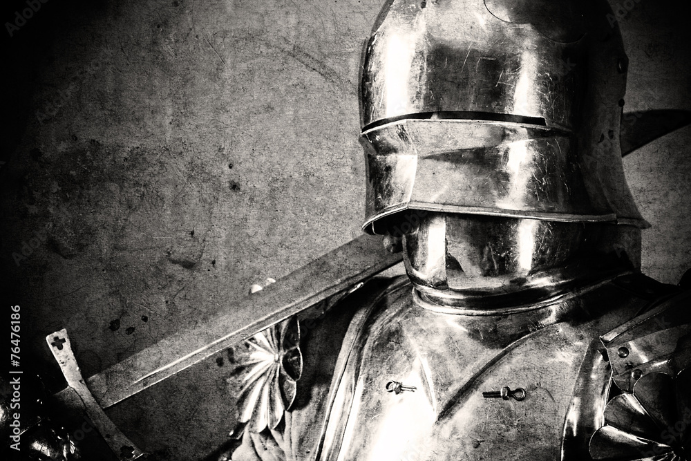 knight wearing armor and holding two-handed sword on his shoulde Stock ...