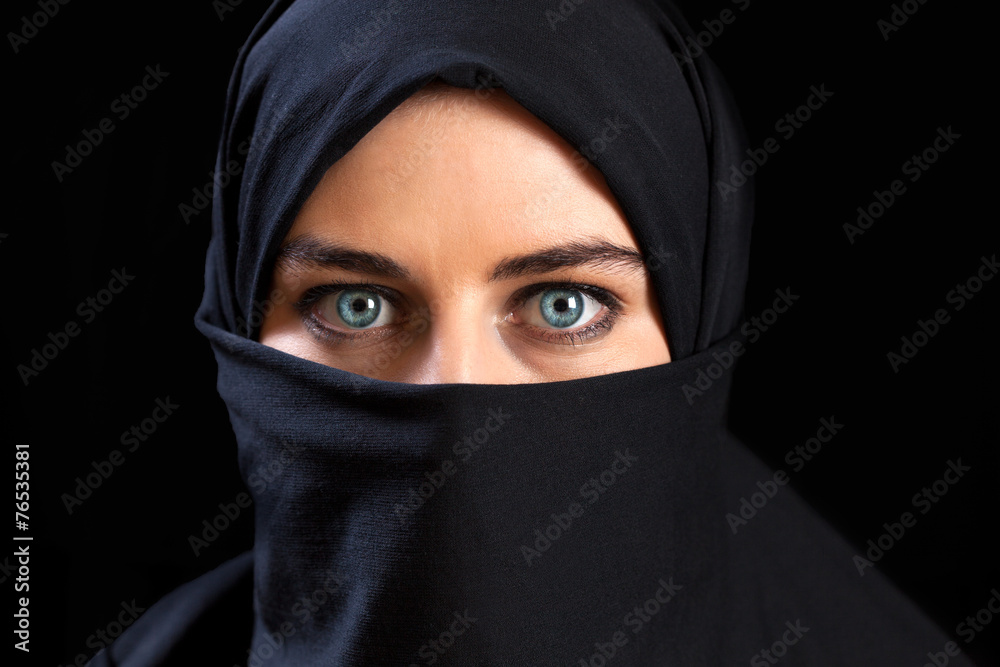 Muslim woman wearing the face veil Stock Photo | Adobe Stock