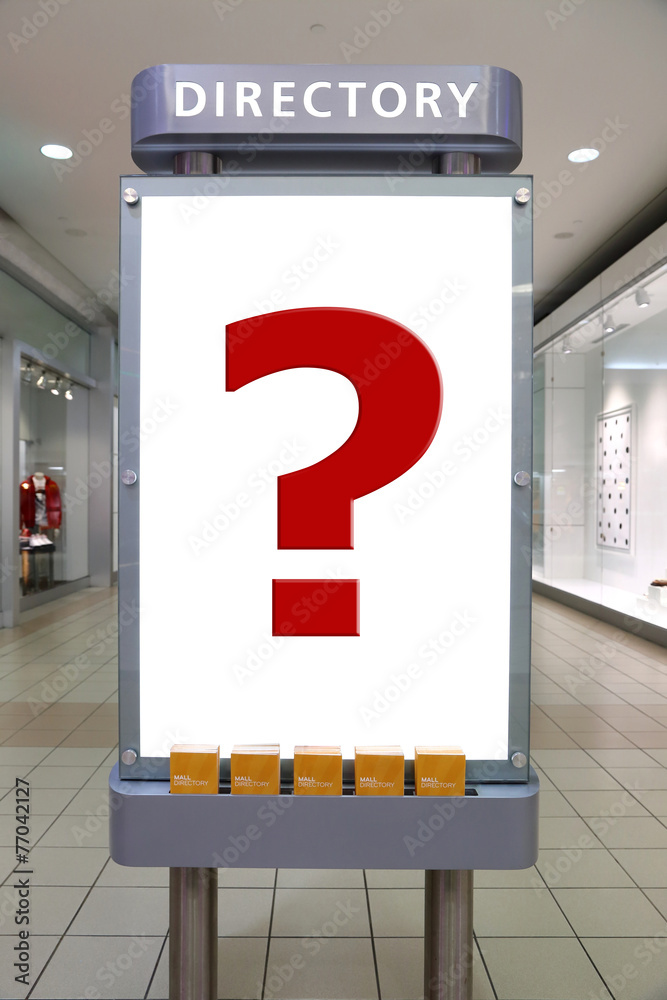 Question mark and direction sign inside shopping mall Stock Photo ...