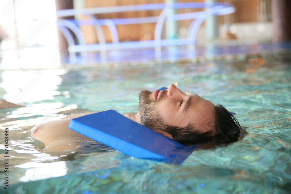 Man in spa pool doing exercises for muscular recovery Stock Photo ...