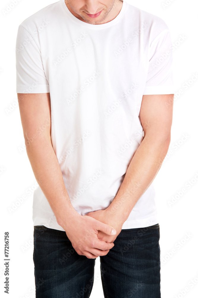 Man covering his crotch Stock 写真 | Adobe Stock