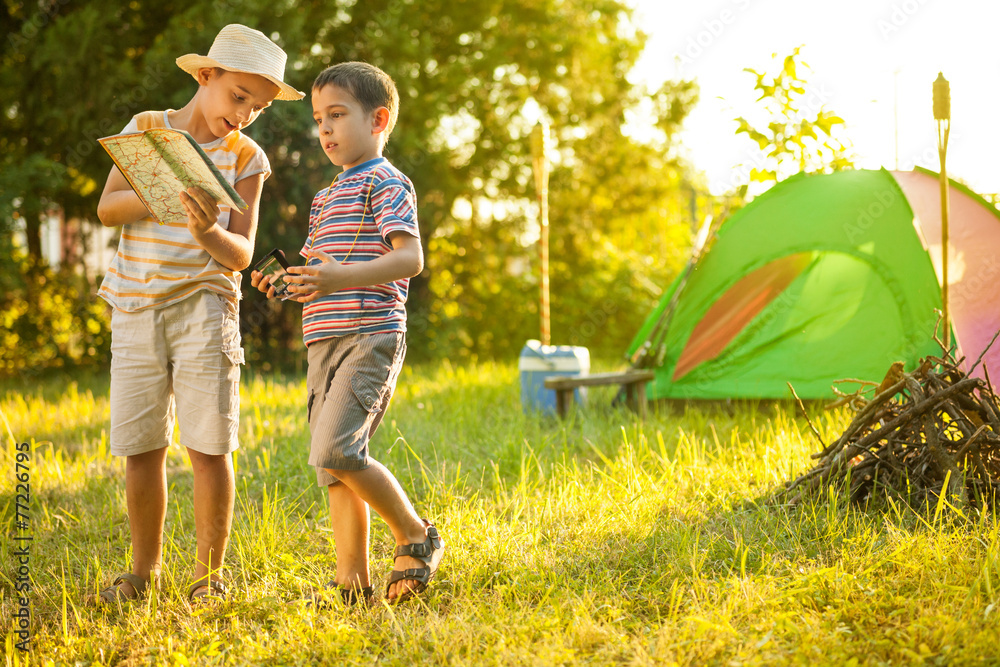 children on a camping trip learning how to read and use a map Stock ...