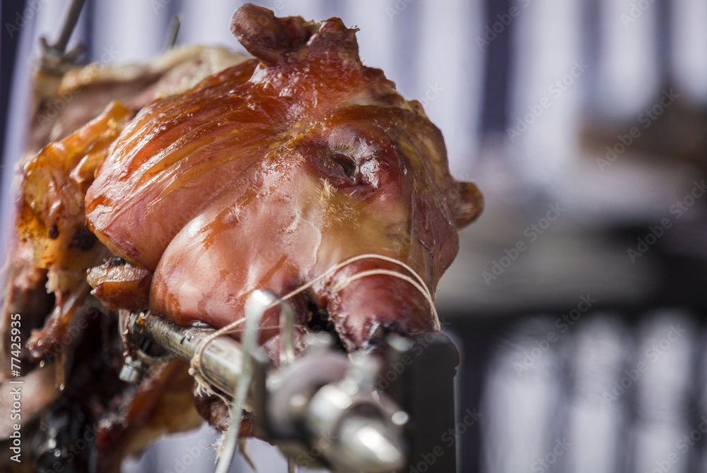 Pig Spit roast Stock Photo | Adobe Stock