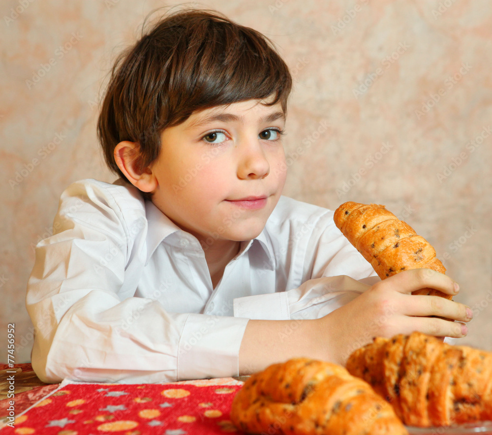handsome preteen boy play with croissan imagine its a sheep Stock Photo ... handsome preteen boy play with croissan imagine its a sheep Stock Photo ...