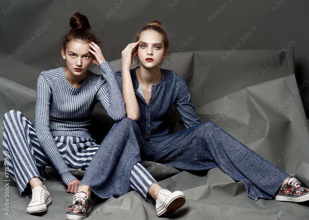 Fashion model pose on light background Stock Photo | Adobe Stock