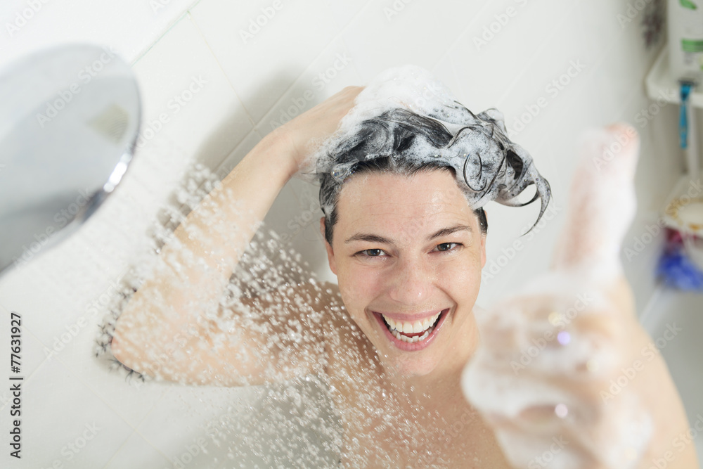 Shower woman. Happy smiling woman washing shoulder showering in Stock ...
