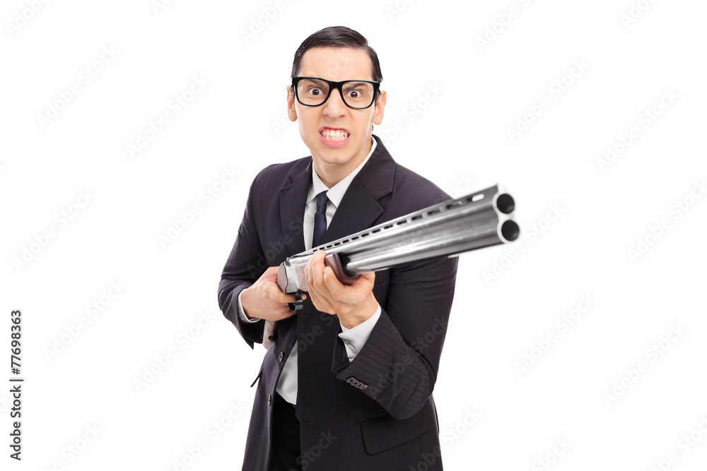 Angry businessman holding a shotgun Stock Photo | Adobe Stock