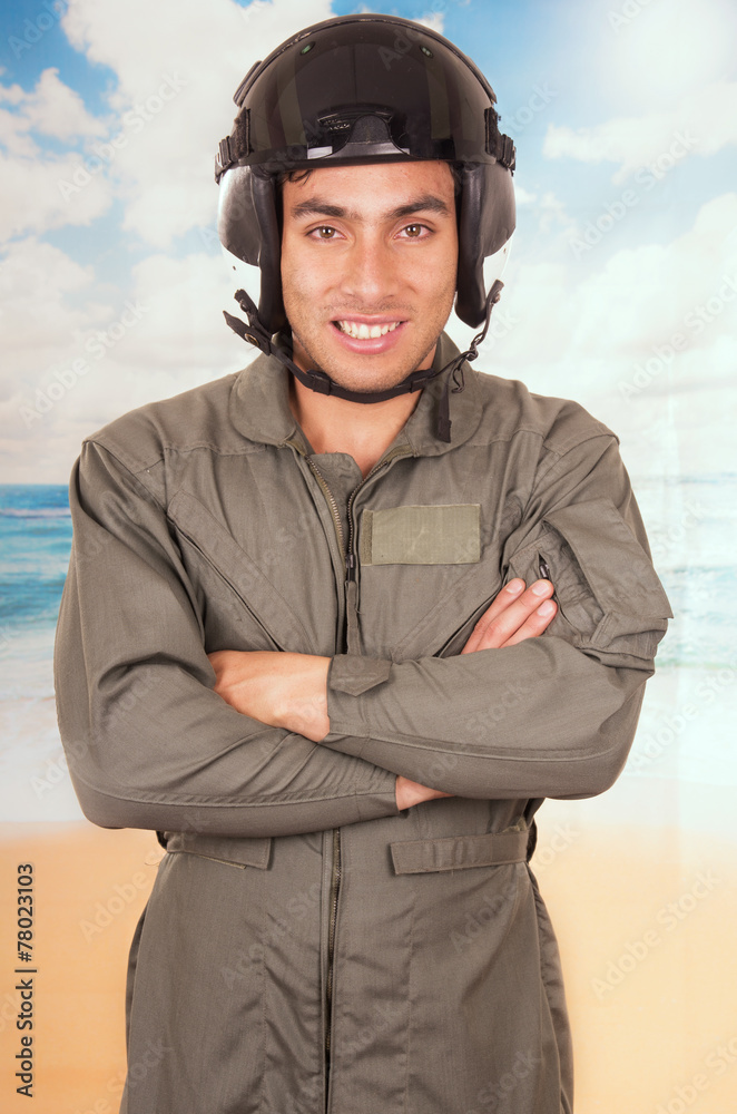young handsome pilot wearing uniform and helmet over beach Stock Photo ...