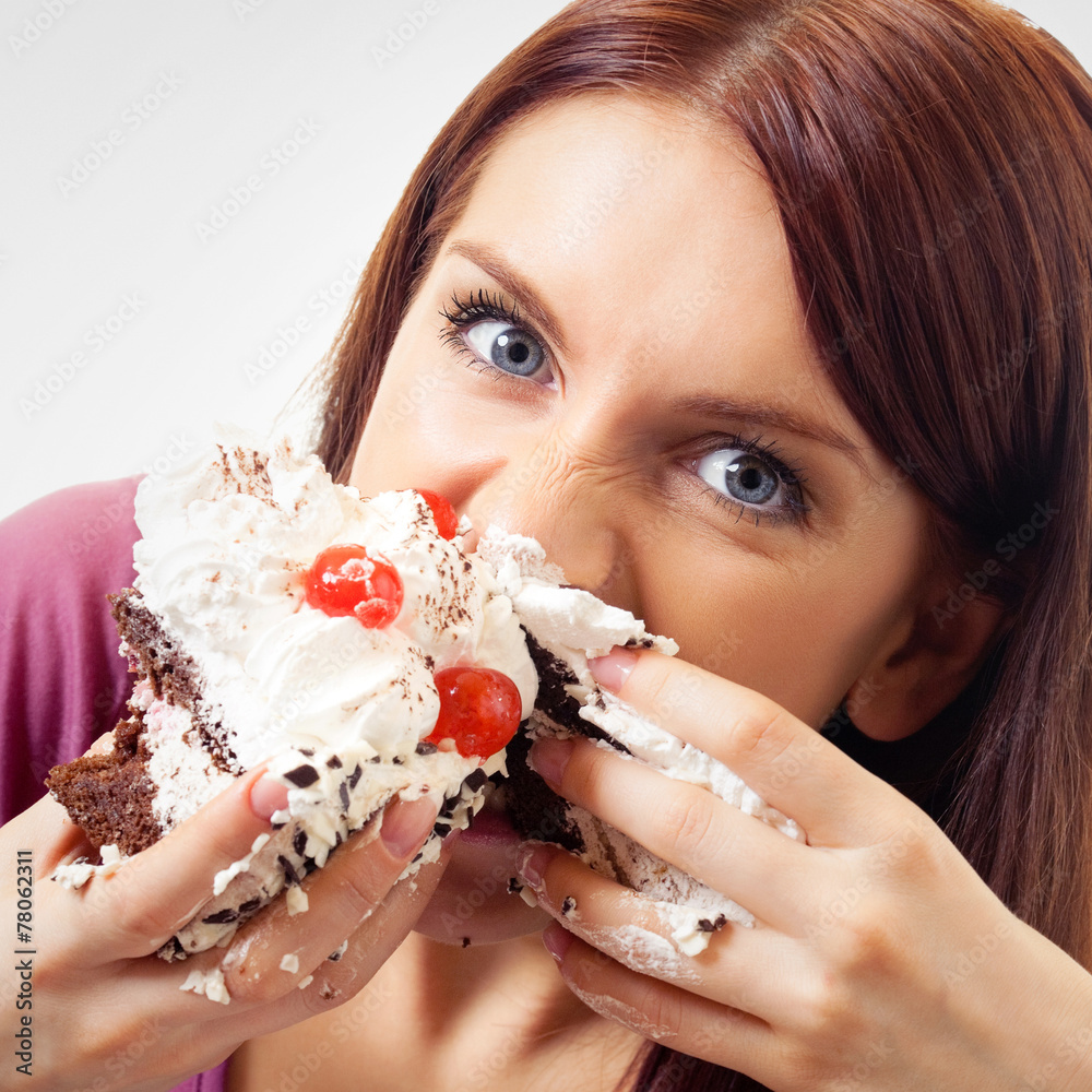 Woman eating pie Stock Photo | Adobe Stock
