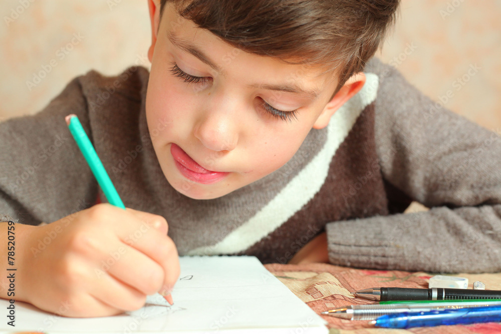 preteen handsome boy drawing with colored pencils and crayons Stock ...