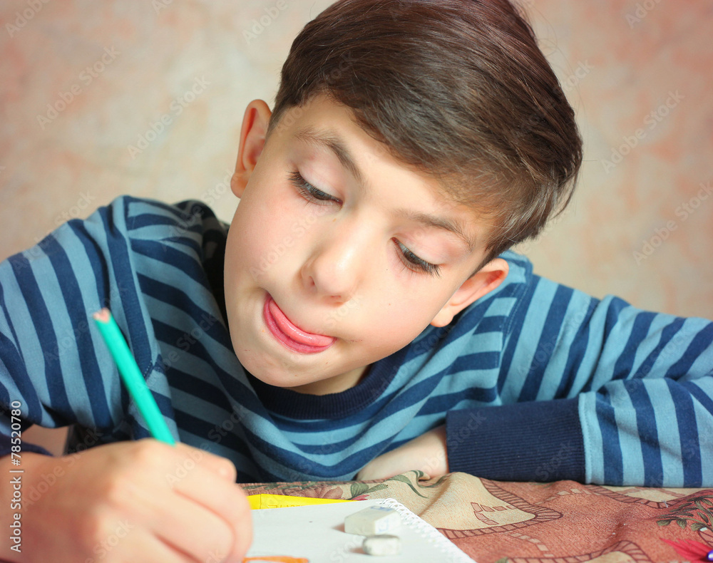 preteen handsome boy drawing with colored pencils and crayons Stock ...