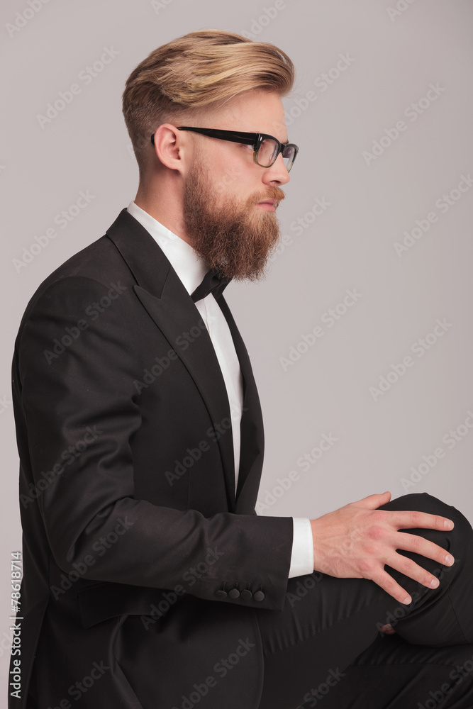 elegant business man sitting with his legs crossed Stock Photo | Adobe ...
