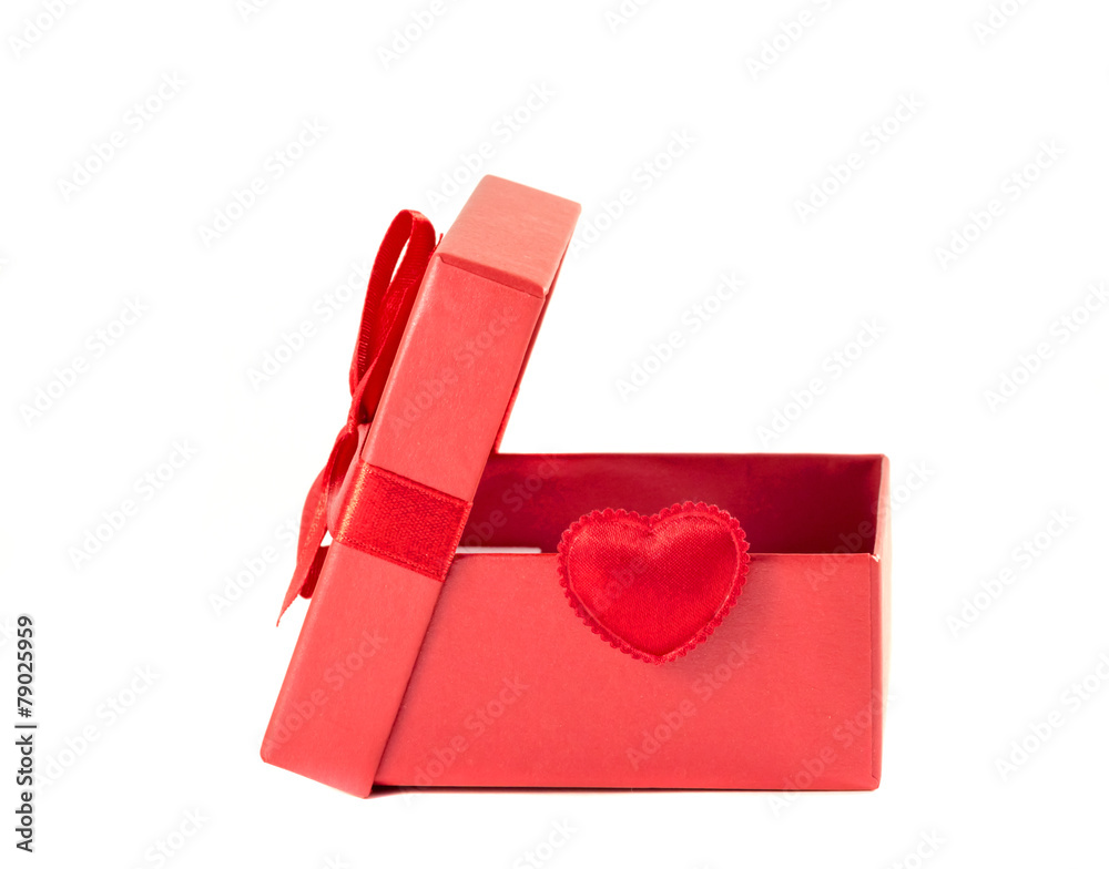 Red box with the lid open with a ribbon on a white background Stock ...