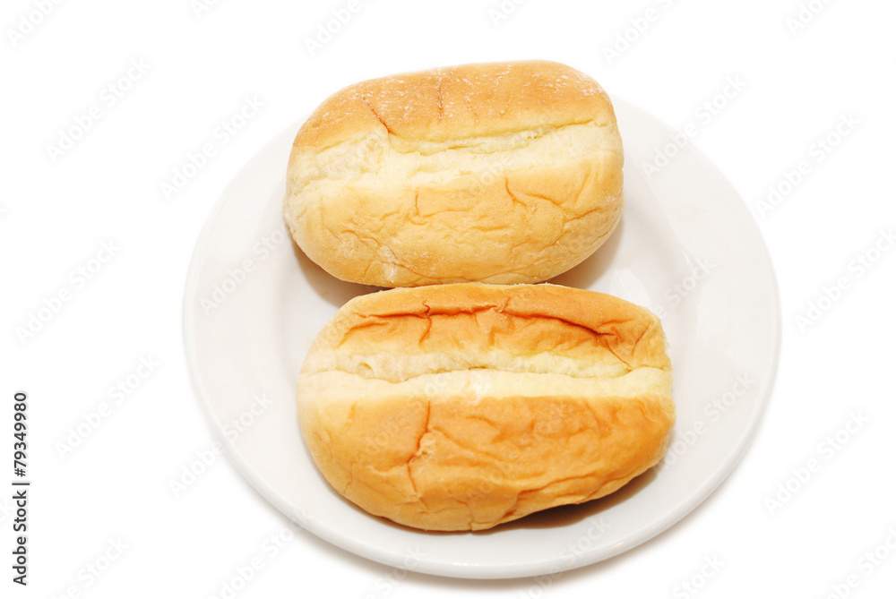 Two Dinner Rolls on a White Plate Stock Photo | Adobe Stock