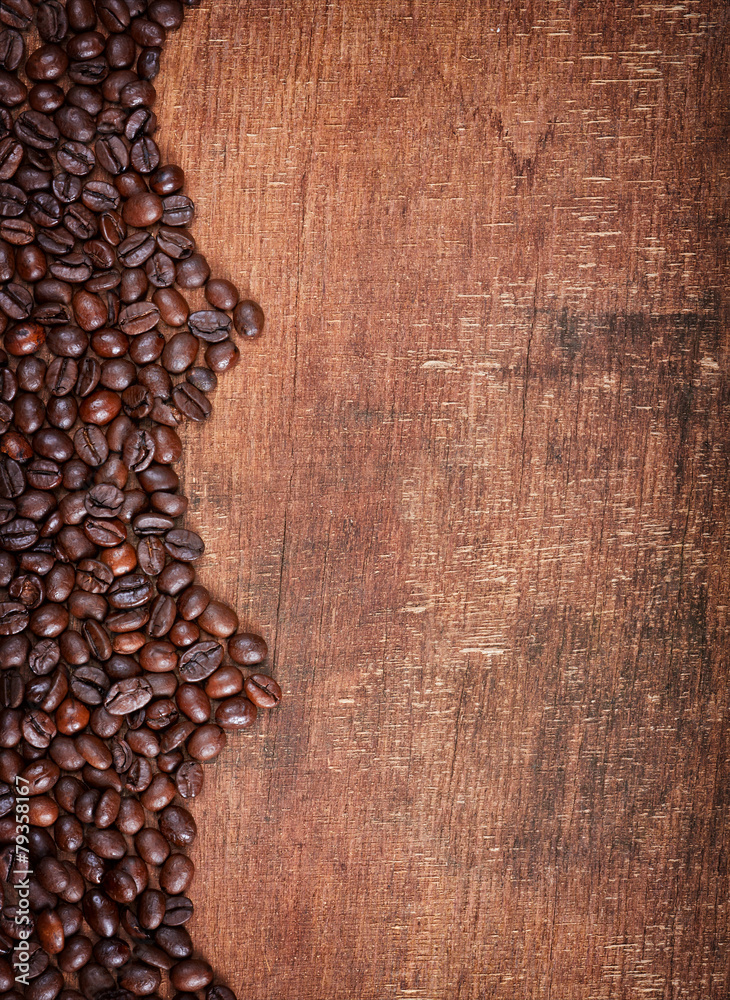 wood background with Coffee beans on it Stock Photo | Adobe Stock