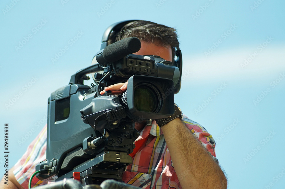 Cameraman is working Stock Photo | Adobe Stock