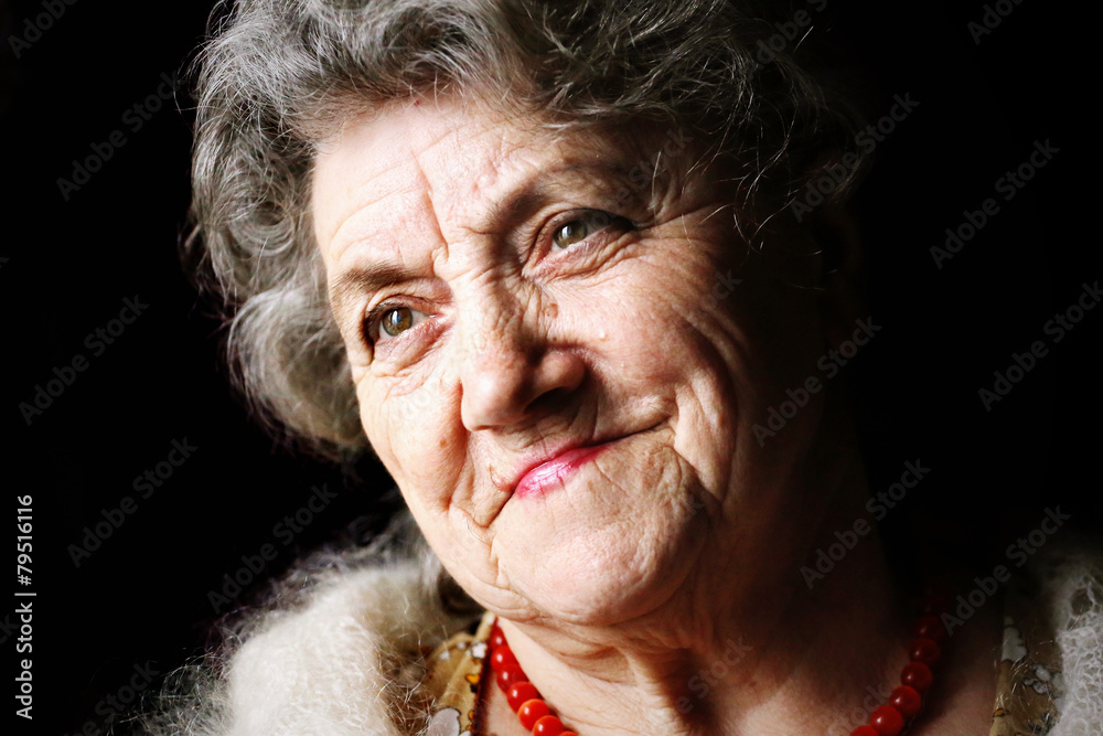 Smile granny face on a black background Stock Photo | Adobe Stock