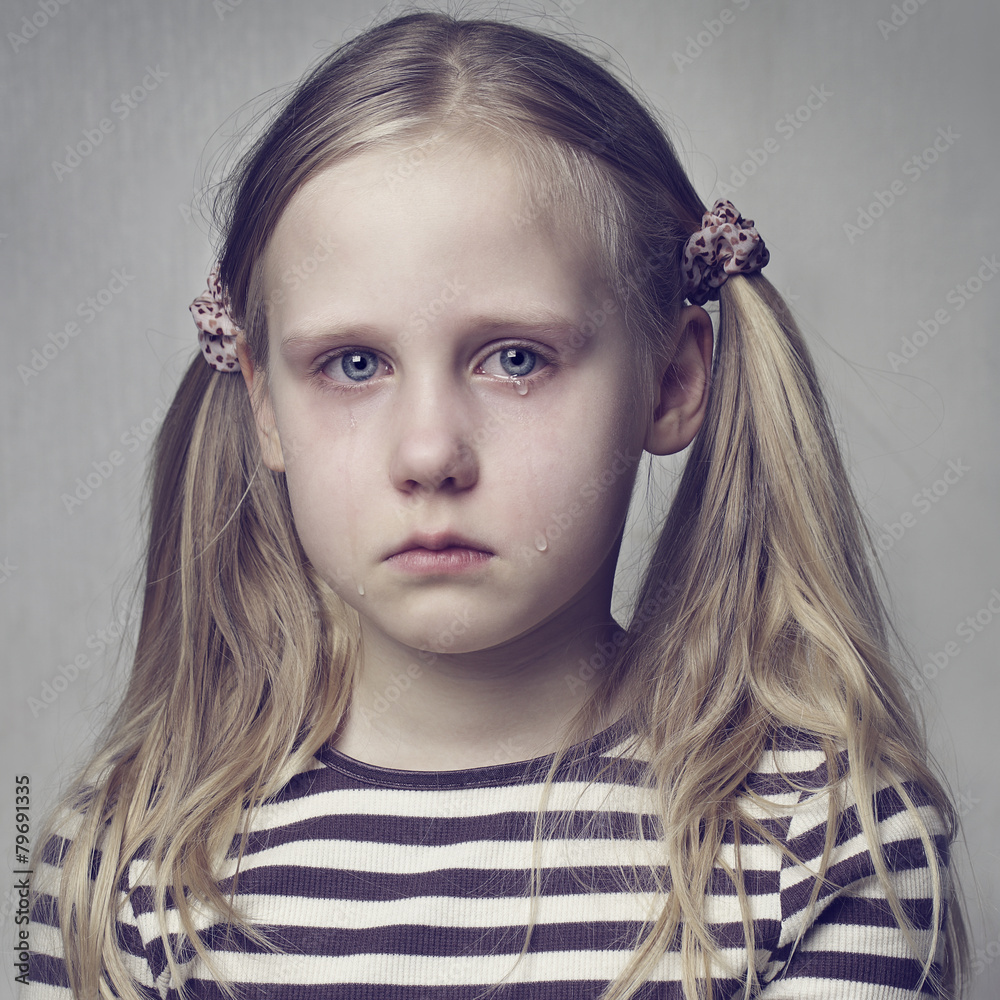 Little girl crying with tears Stock Photo | Adobe Stock Little girl crying with tears Stock Photo | Adobe Stock