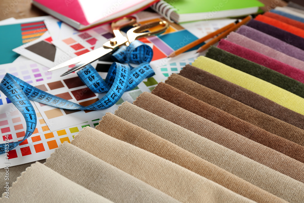 Scraps of colored tissue with palette and measuring tape close Stock ...