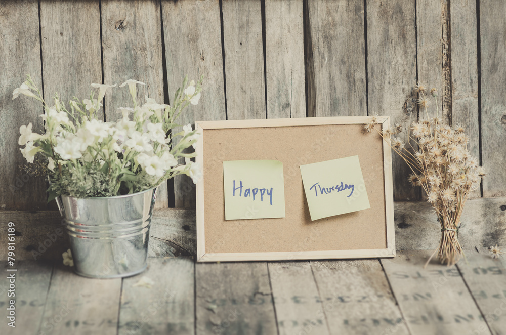 Vintage style effect Happy Thursday message on corkboard with fl Stock ...
