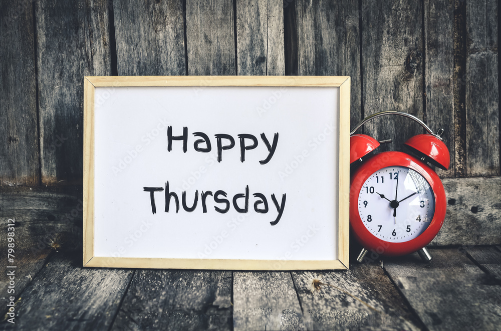 Happy Thursday message on white board and red retro clock by wo Stock ...