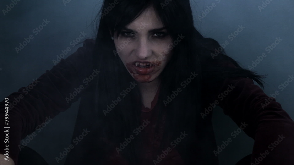 Beautiful female vampire with fog light and blood thinking 素材庫影片 ...