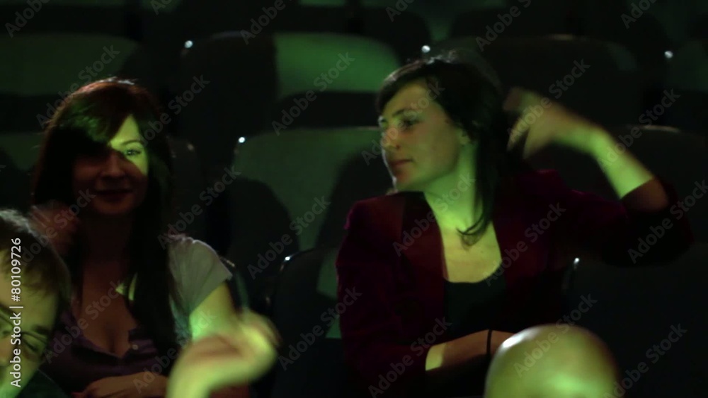 Theater audience breaks out into spontaneous dance routine. Jib-mounted ...