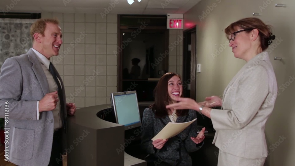 Office workers celebrate a successful deal, then the female boss slaps ...