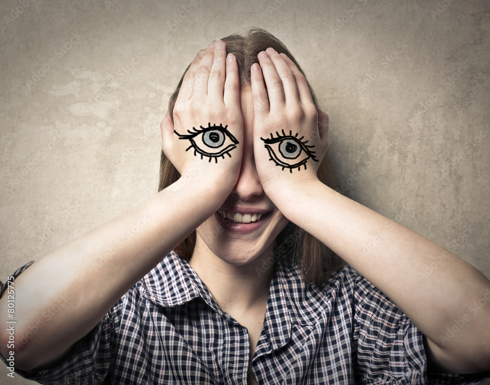 Girl squinting at you Stock Photo | Adobe Stock