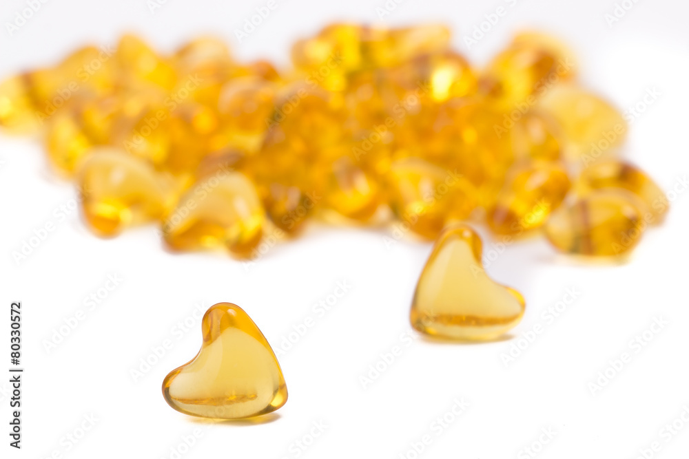 heart color pills of fish oil Stock Photo | Adobe Stock