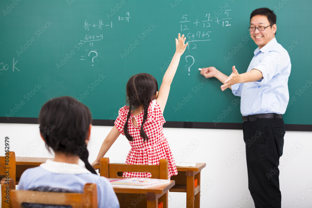 teacher asking question with children in classroom Stock Photo | Adobe ...