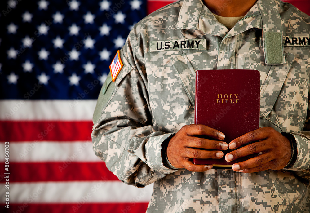 Soldier: Holding a Bible in Front of Him Stock Photo | Adobe Stock