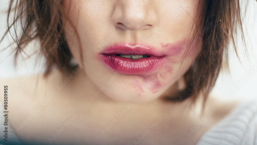 Sexual lips with the smeared lipstick Stock Photo | Adobe Stock