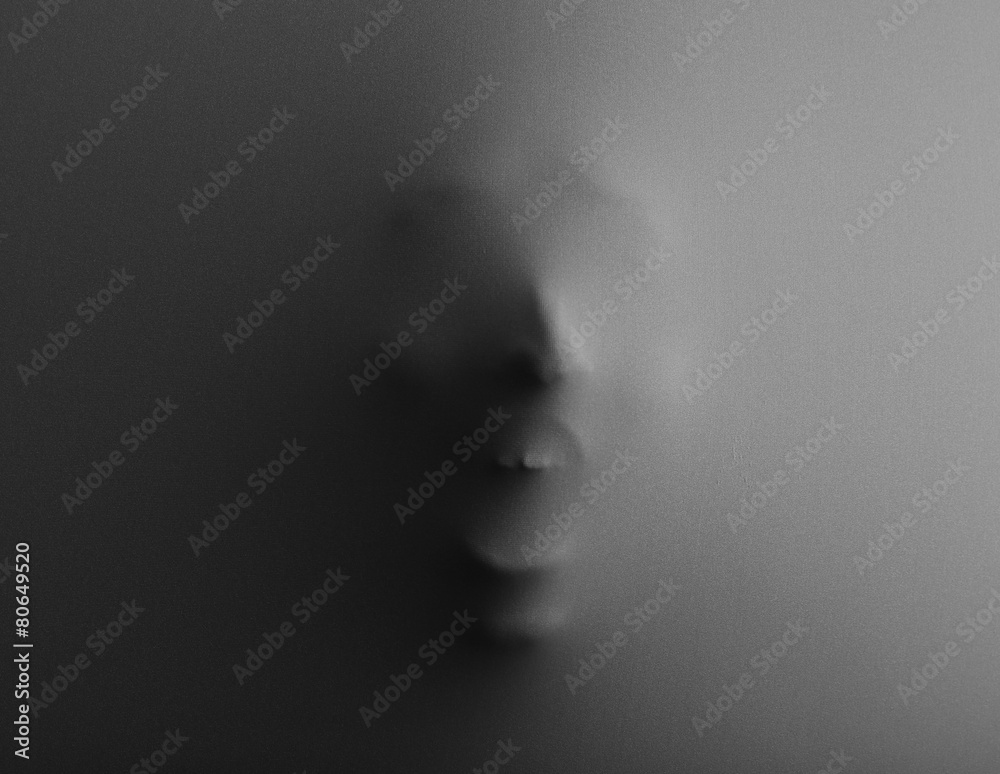 Screaming human face pressing through fabric as horror Stock Photo ...