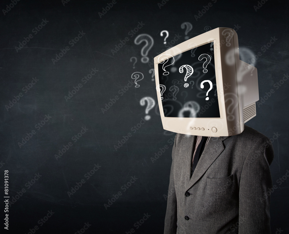 Businessman with a computer monitor head and question marks foto de ...
