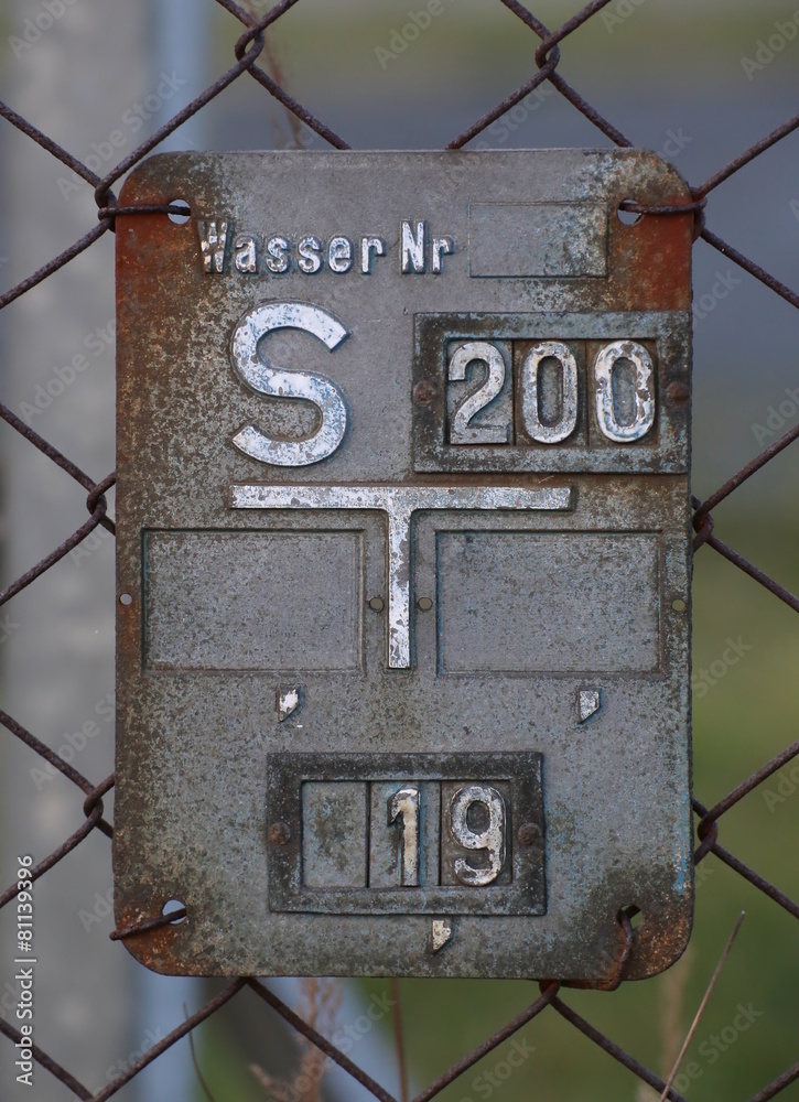 Historical gate valve sign for water supply in Germany. The information ...