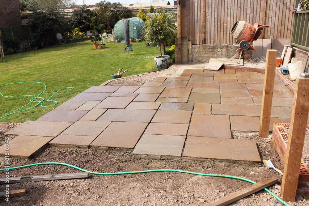 Building and laying a natural stone patio Stock Photo | Adobe Stock