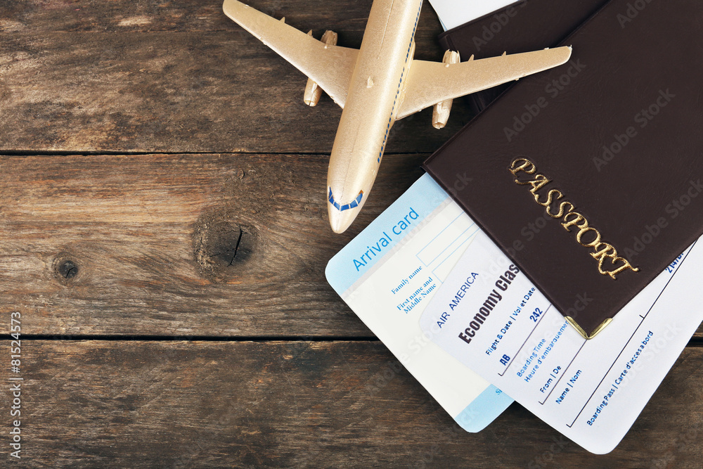 Airline tickets and documents on wooden background Stock Photo | Adobe ...