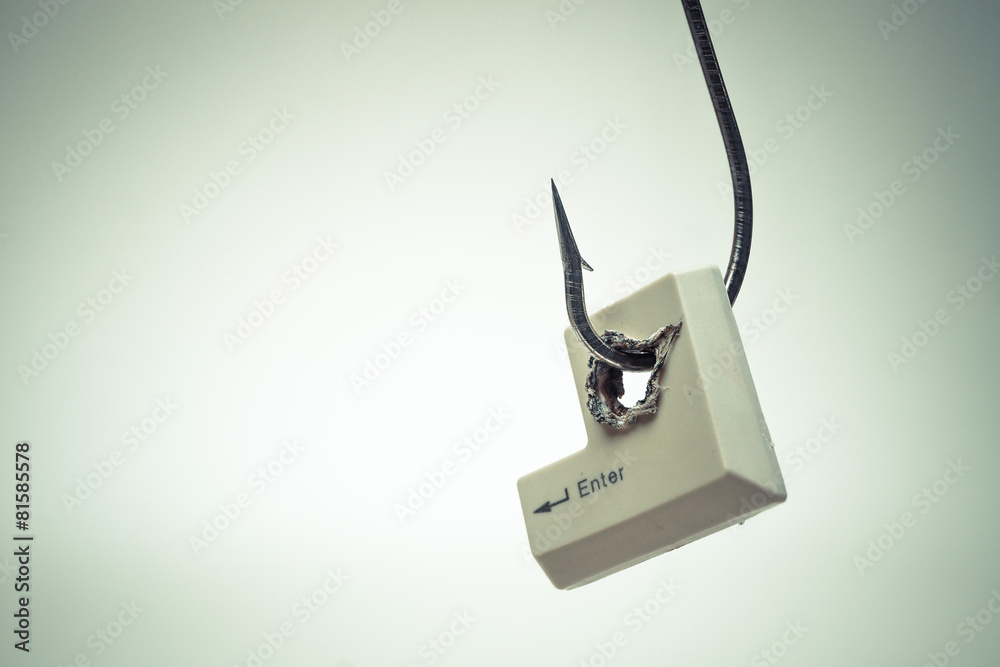 Computer enter button in a fish hook Stock Photo | Adobe Stock