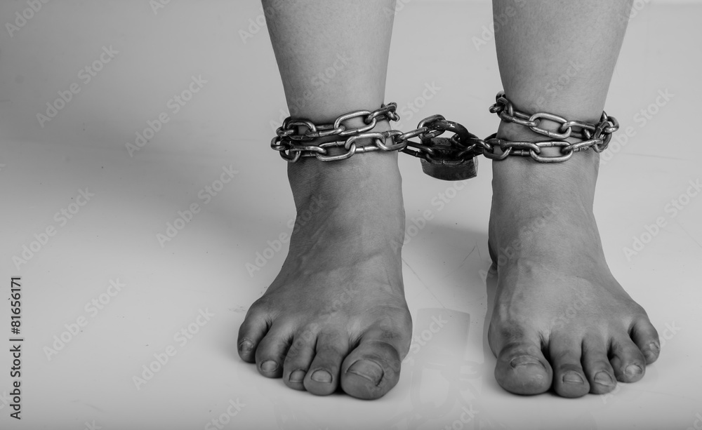 Woman feet was tied by chain isolate on white background Stock Photo ...