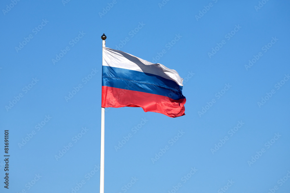 Russian flag on the flagpole waving on sky Stock Photo | Adobe Stock